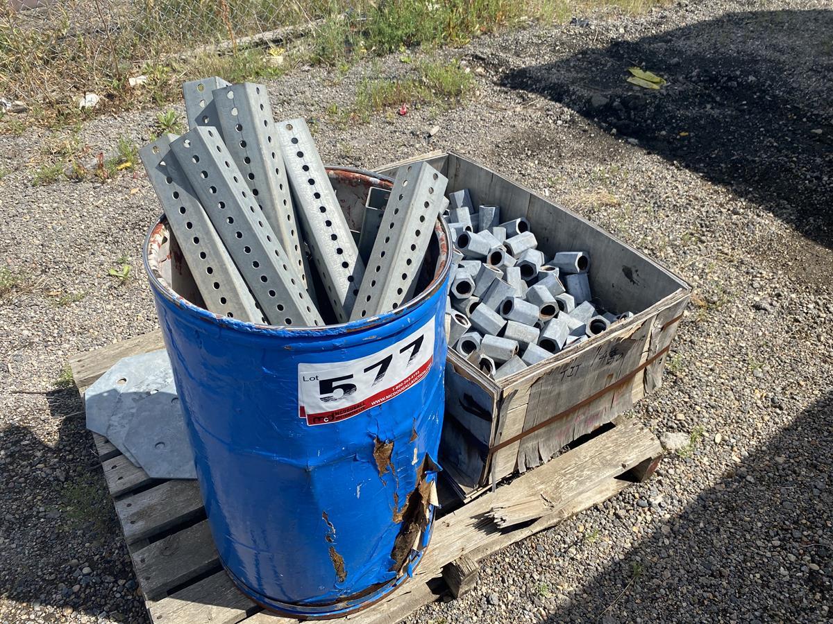 Pallet of Metal Nuts and Telus Bar