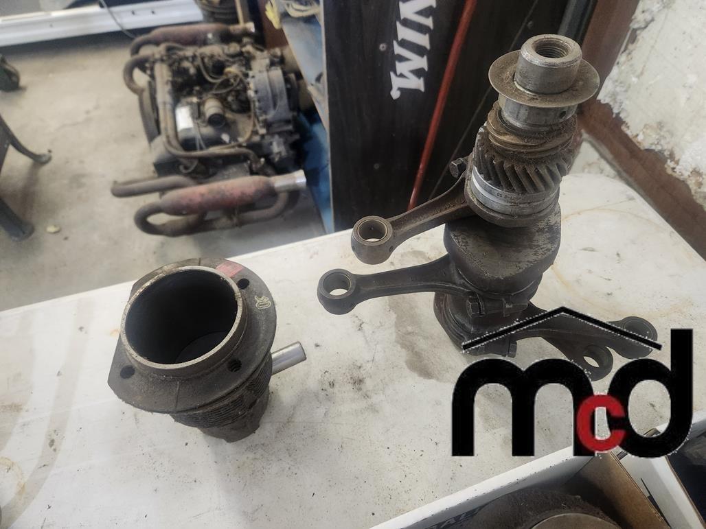 Volkswagen Engine Parts and Pistons in Boxes