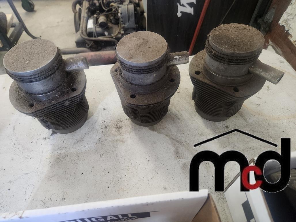 Volkswagen Engine Parts and Pistons in Boxes