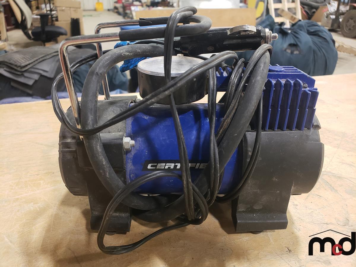 Box of Tire Repair Kit & Air Pump