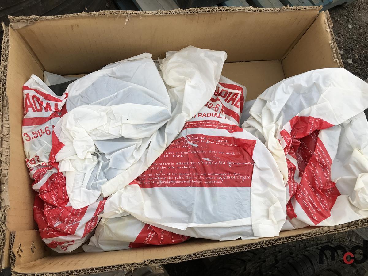 Unused Boxes of Tire Tubes and Valves