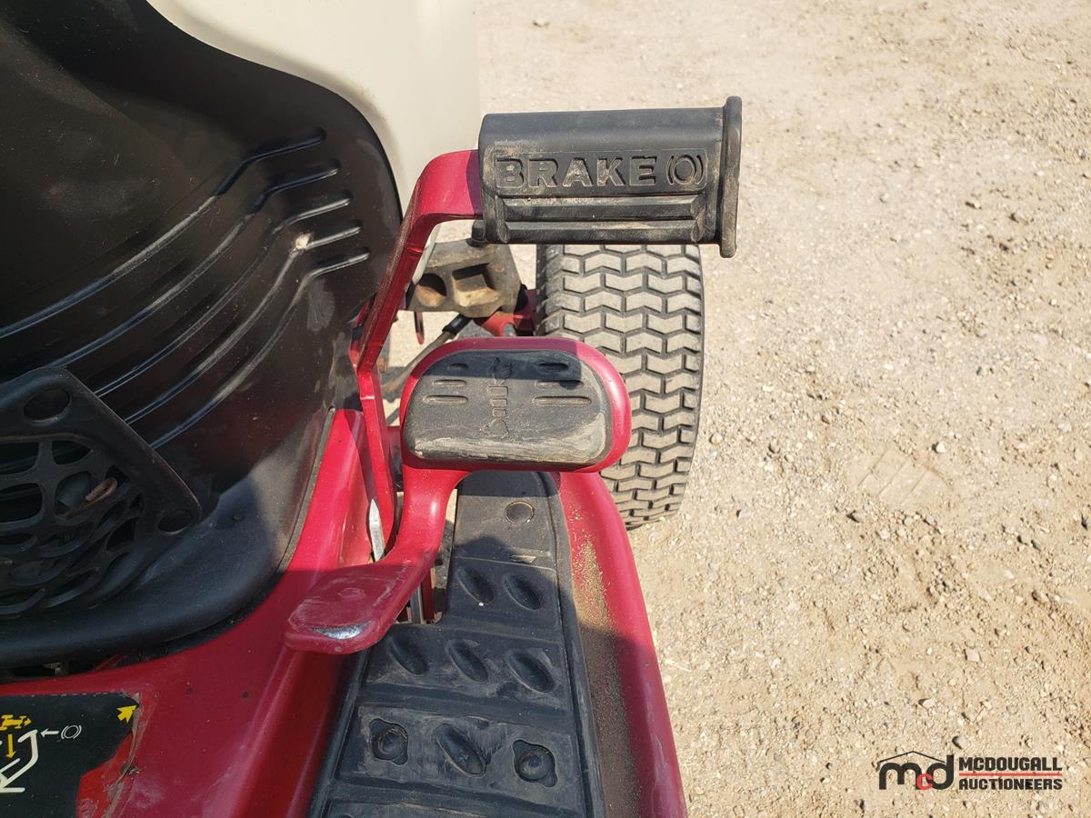 White Outdoor Riding Mower w/ Rototiller Attachment