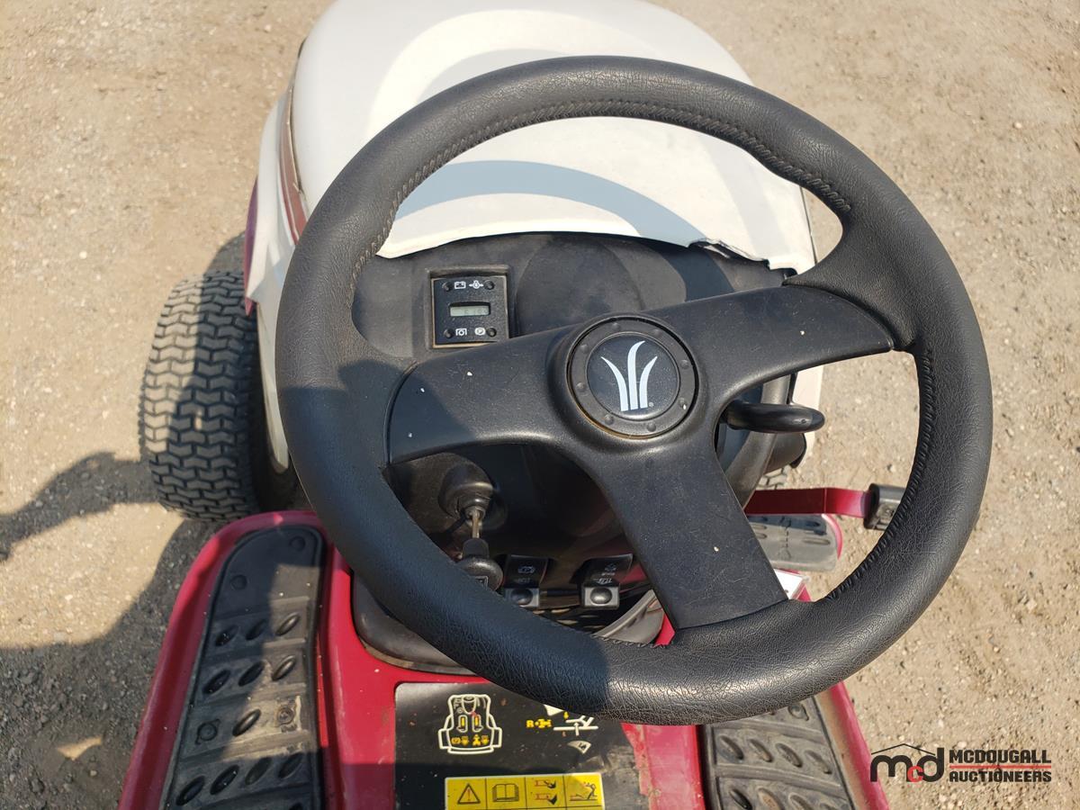 White Outdoor Riding Mower w/ Rototiller Attachment