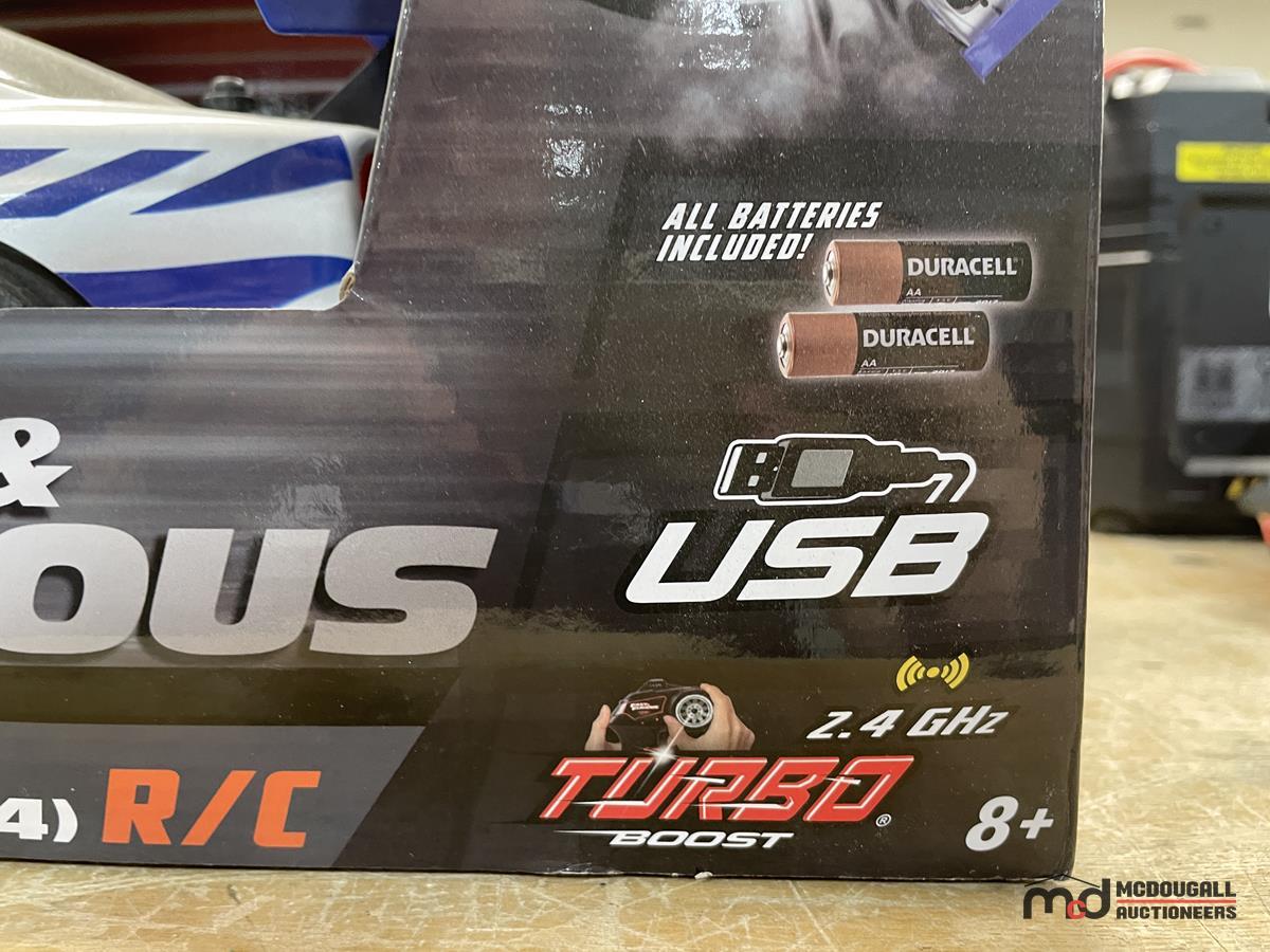 CAT 1,200A Battery Booster, (2) Remote Control Cars