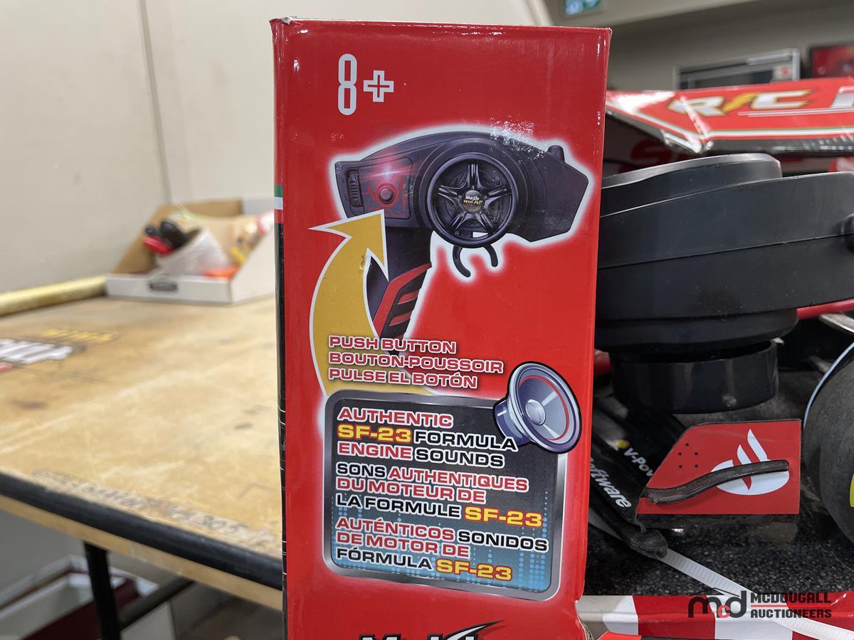 CAT 1,200A Battery Booster, (2) Remote Control Cars