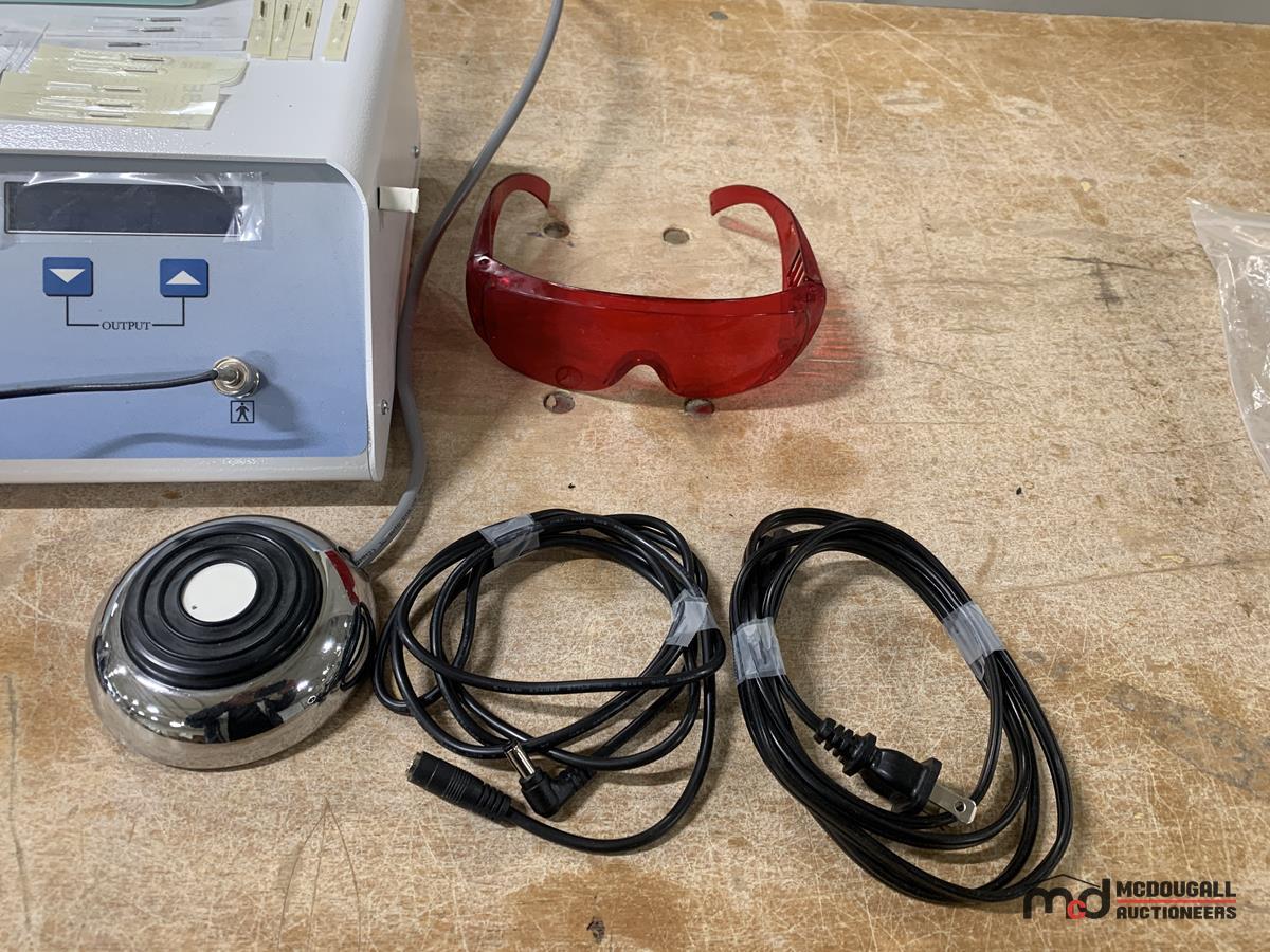 Lamprobe Model 4000 Machine, The Boss Sign, Glasses, Wires and Plugs