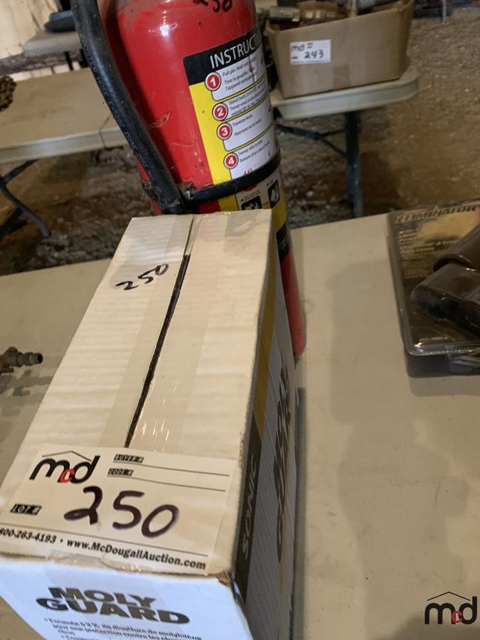 Box of Moly Guard Grease and Fire Est