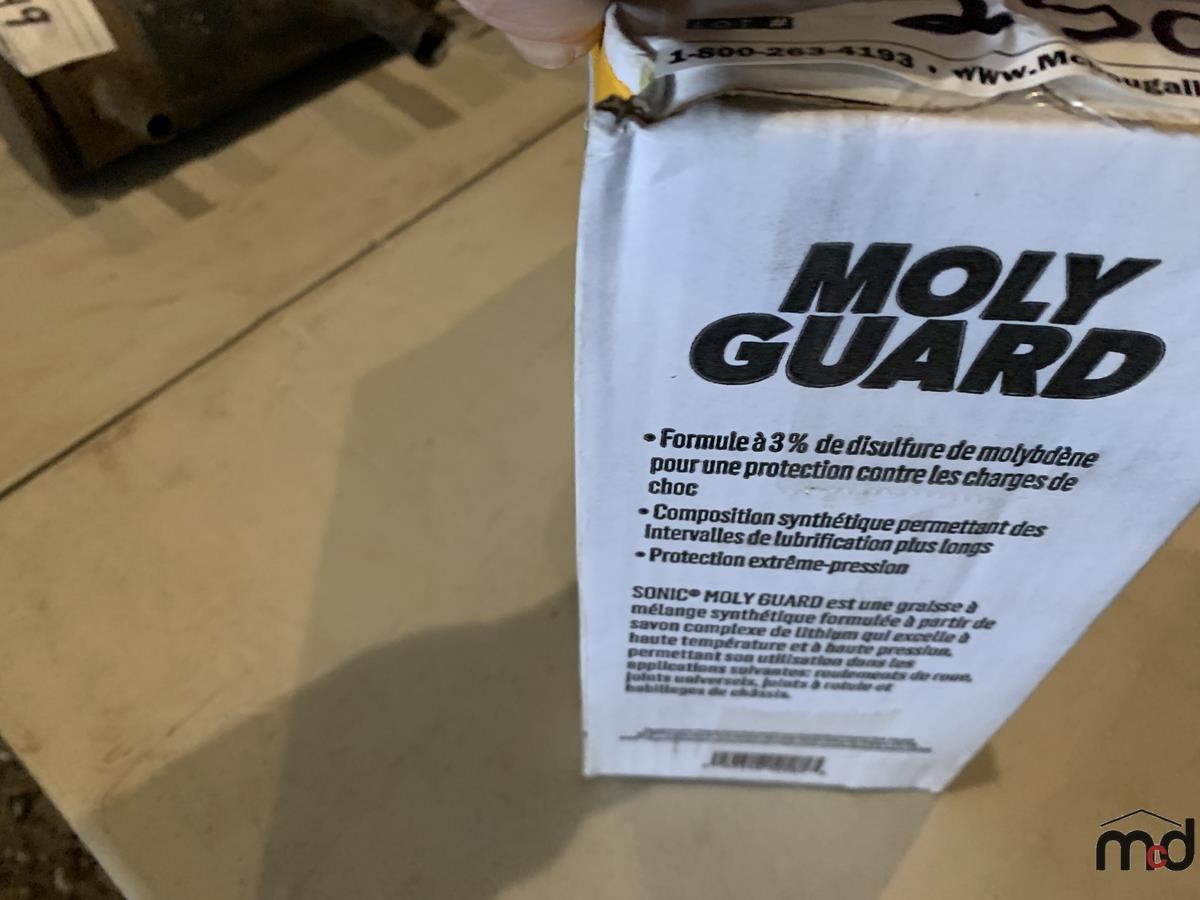 Box of Moly Guard Grease and Fire Est